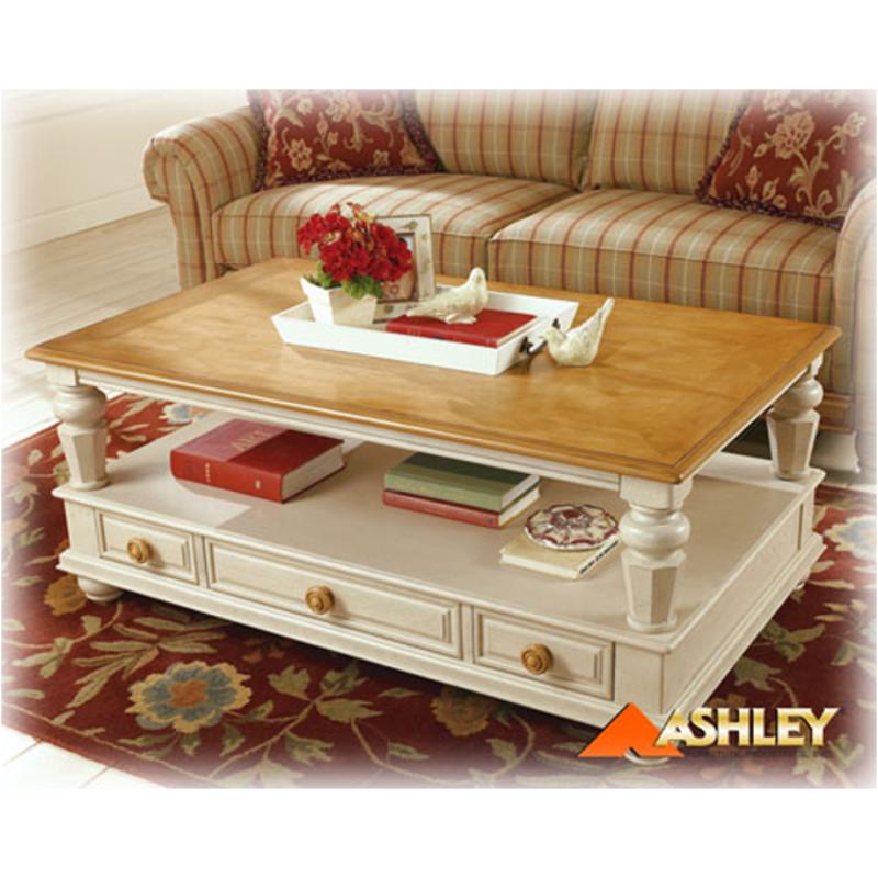 T432-1 Ashley Furniture Rect Cktl Tbl Cream/ltbrn Fnsh