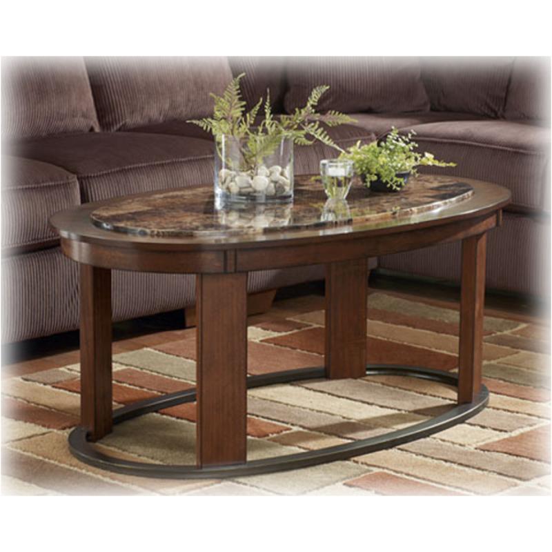 T398-0 Ashley Furniture Theo Oval Cocktail Table