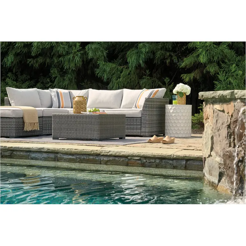 P301 070 Ashley Furniture Cherry Point Sectional With Ottoman